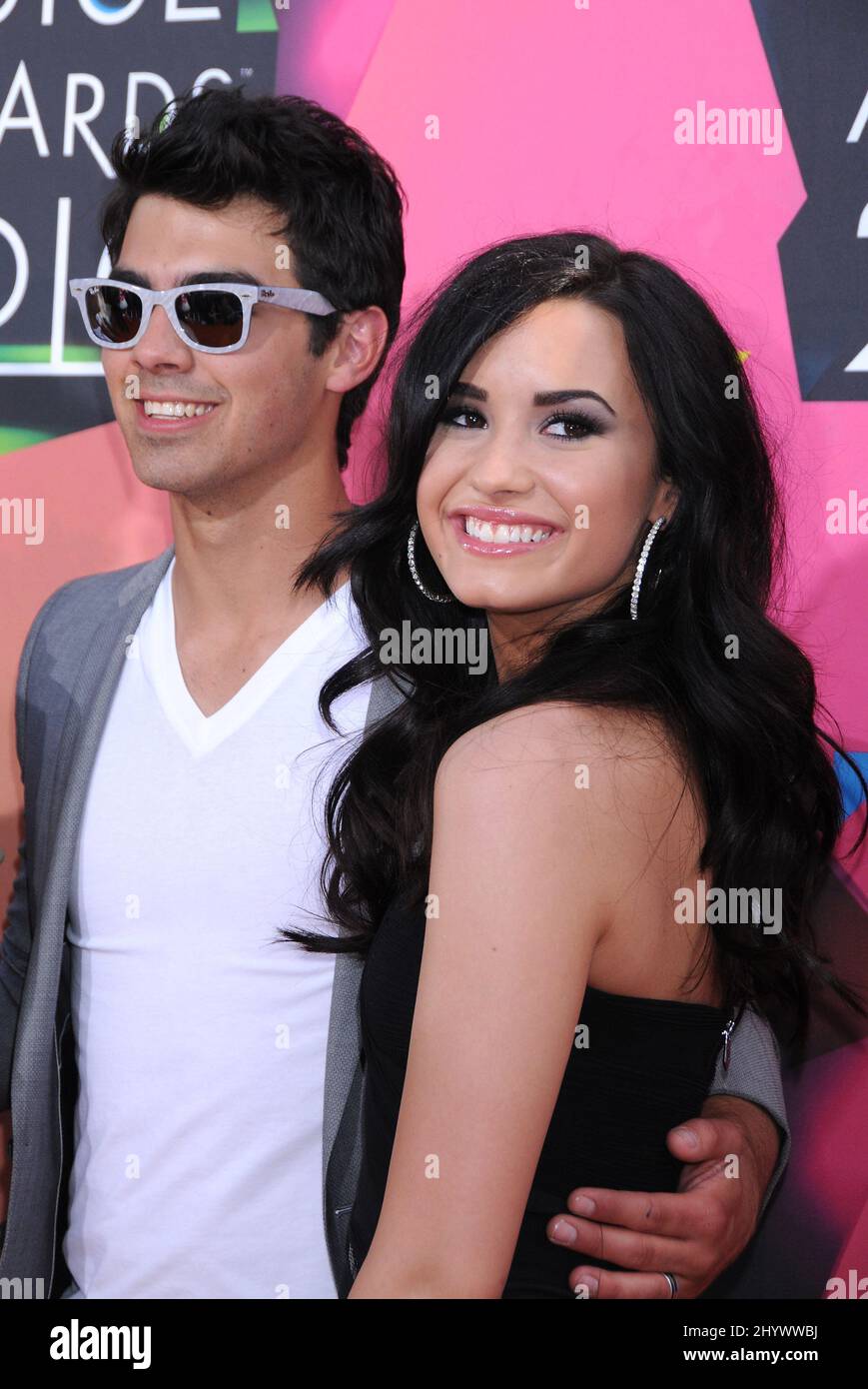 Joe Jonas and Demi Lovato arriving at Nickelodeon's 23rd Annual Kid's ...