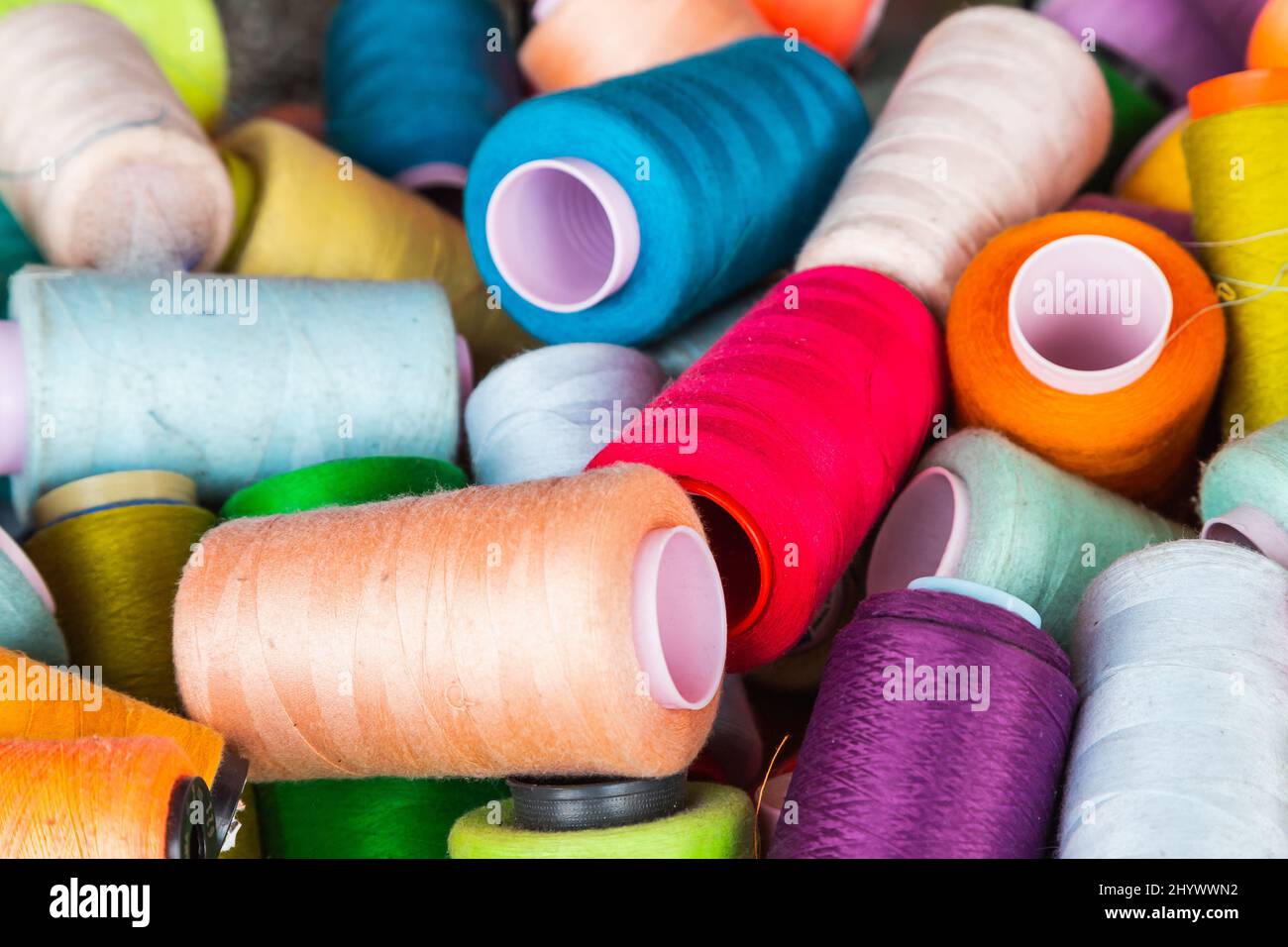 rainbow natural threads . Symbols of knitting and a tractional female ...