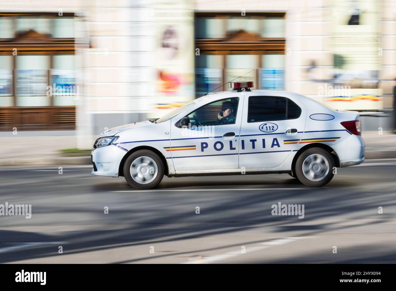 White police car in the street Stock Photo - Alamy