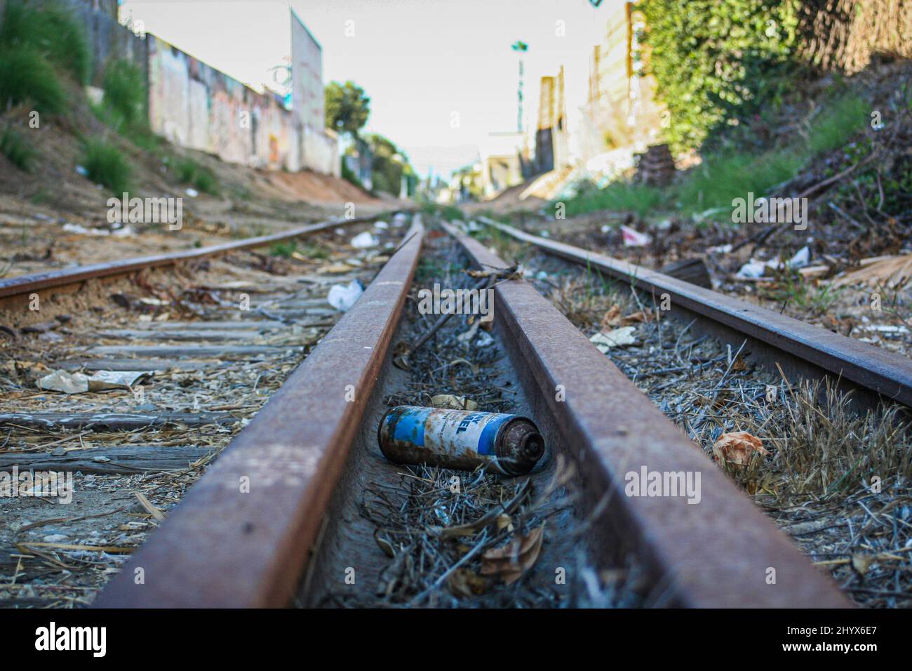 Old, rusted spray can on an abandoned railroad track Stock Photo - Alamy