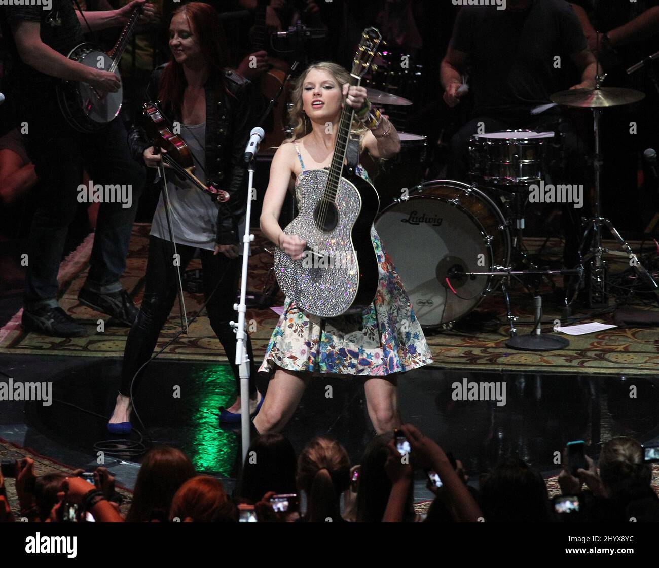 Taylor Swift performs suring a 13 Hour Meet and Greet held at the ...