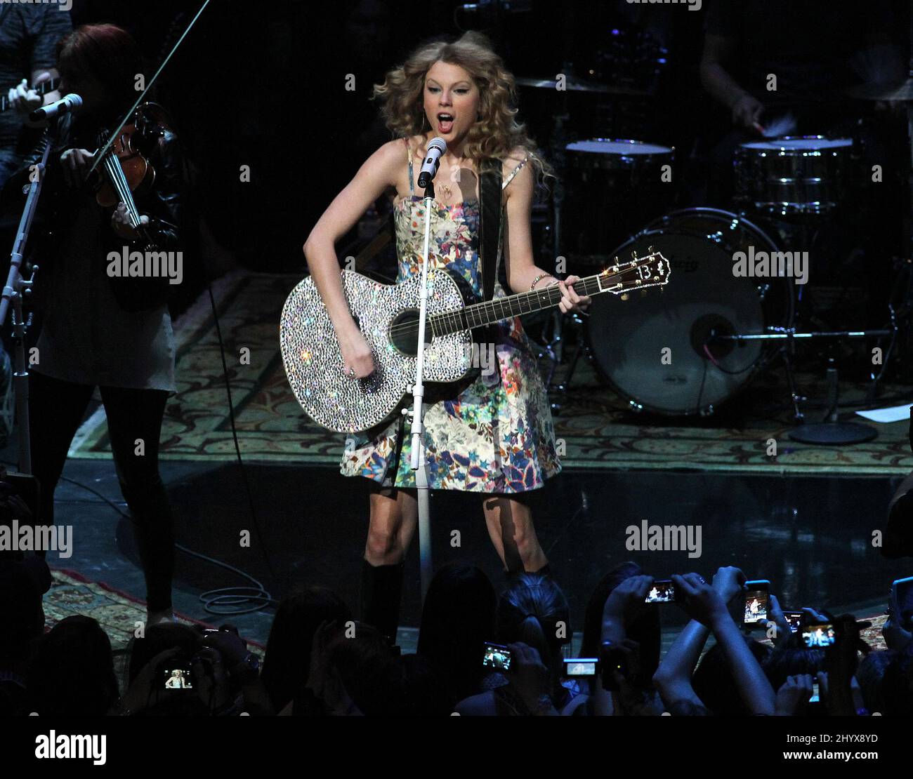 Taylor Swift performs suring a 13 Hour Meet and Greet held at the ...