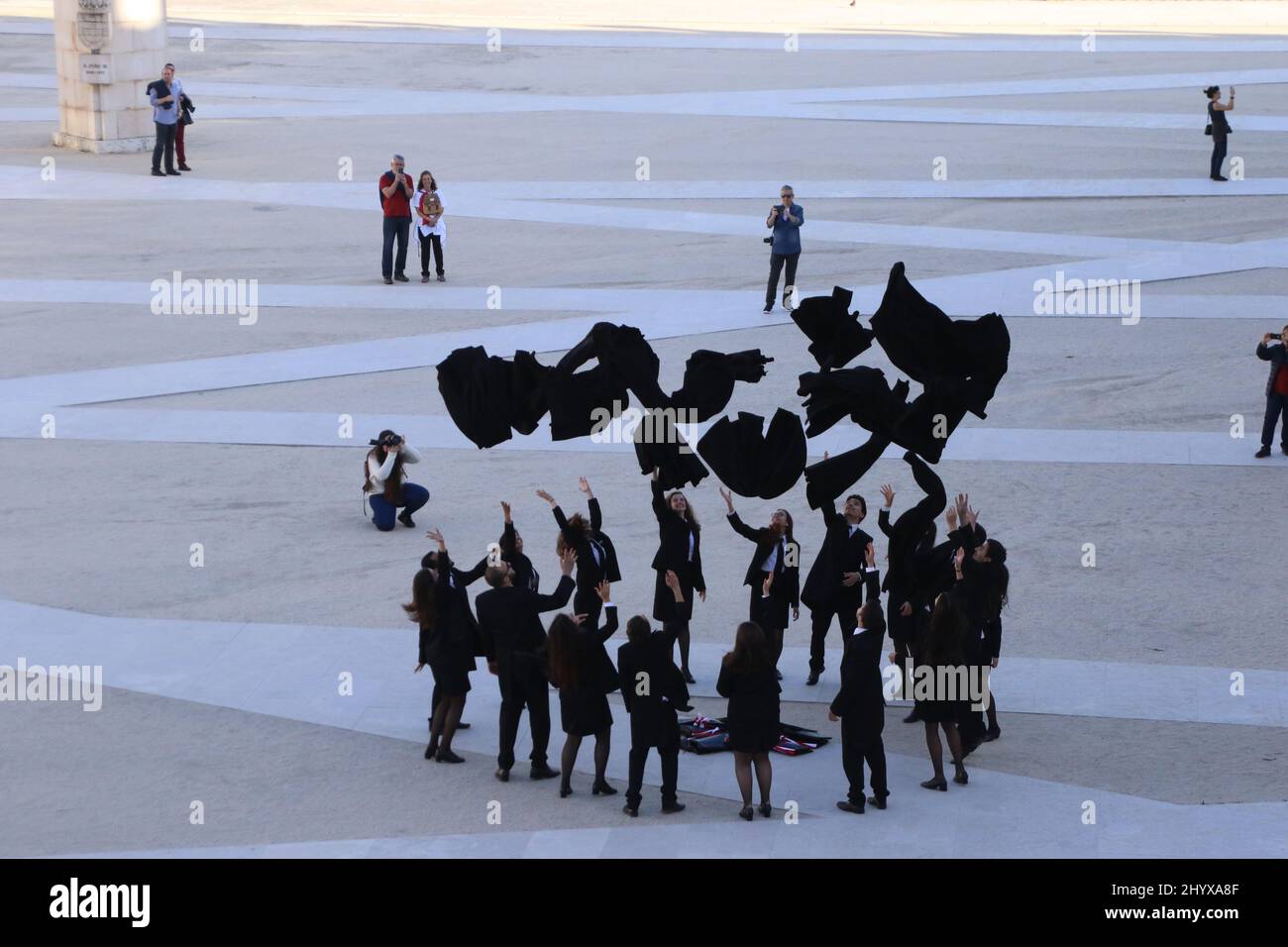 Beautiful shot of students celebrating their graduation at the Coimbra ...