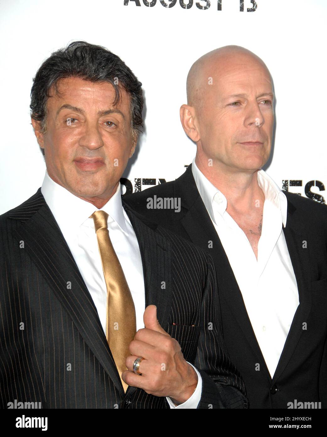 Sylvester Stallone and Bruce Willis at the Expendables premiere held at ...