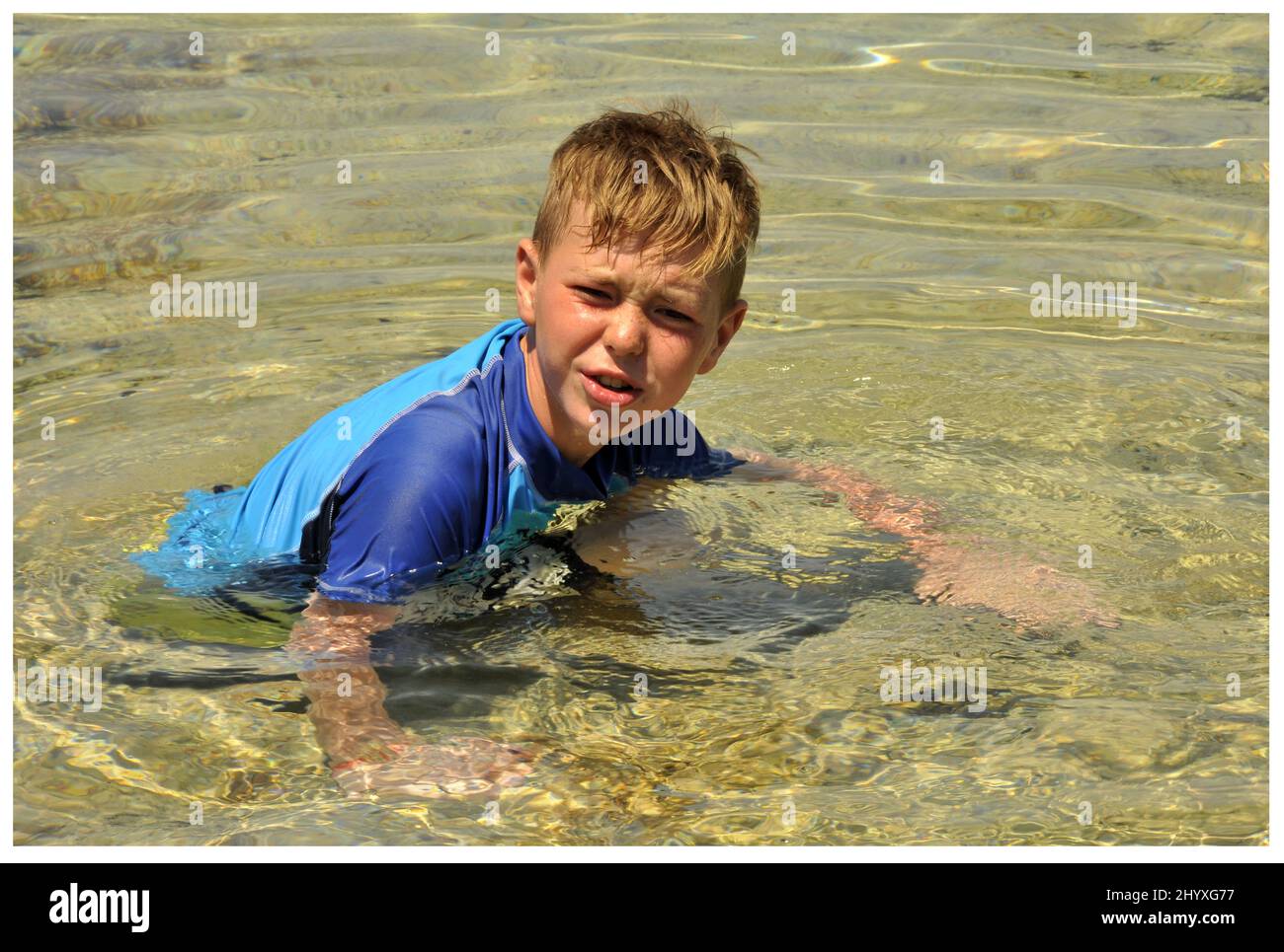 Boy in Water Stock Photo - Alamy