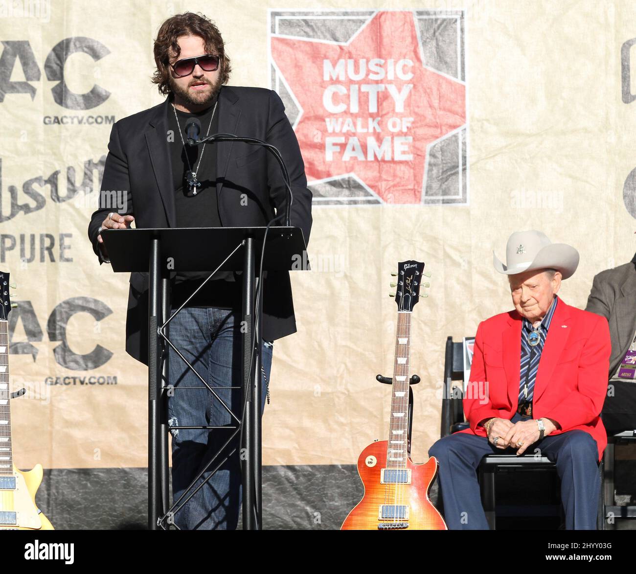 Randy Houser and Little Jimmy Dickens at a ceremony where Rascal Flatts ...