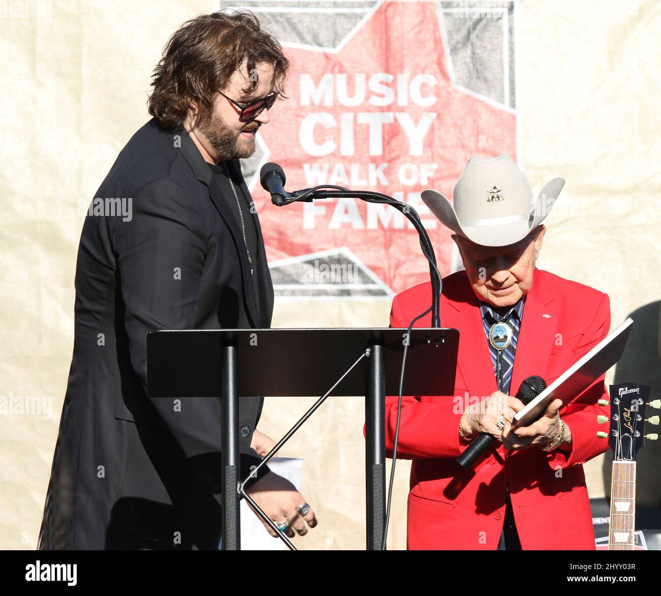 Randy Houser and Little Jimmy Dickens at a ceremony where Rascal Flatts ...