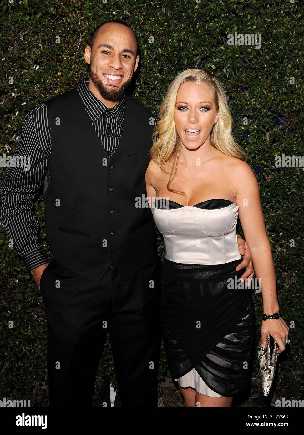 Kendra Wilkinson and her husband Hank arriving for the COVERGIRL ...