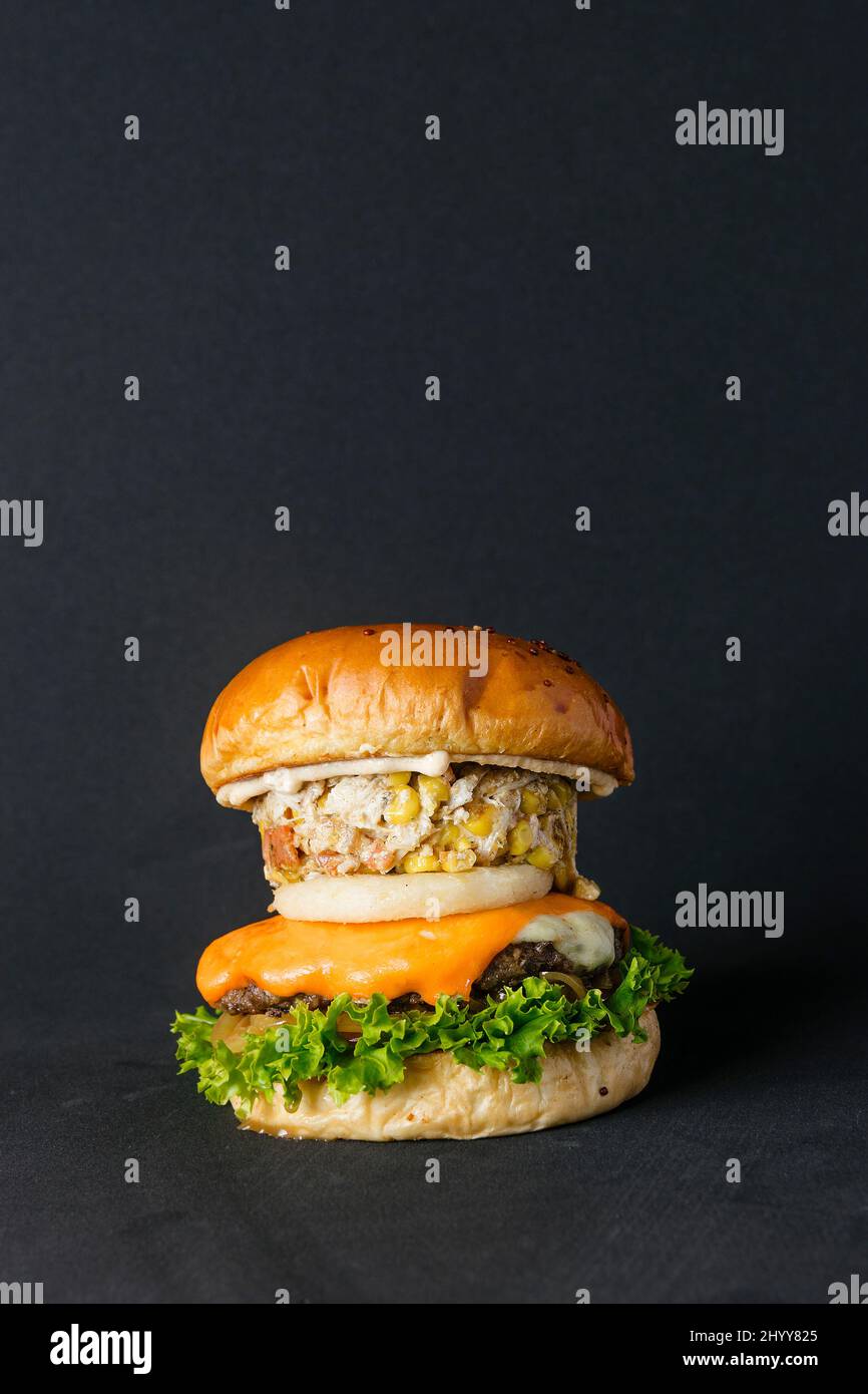 delicious burger ready to enjoy with family or friends Stock Photo - Alamy