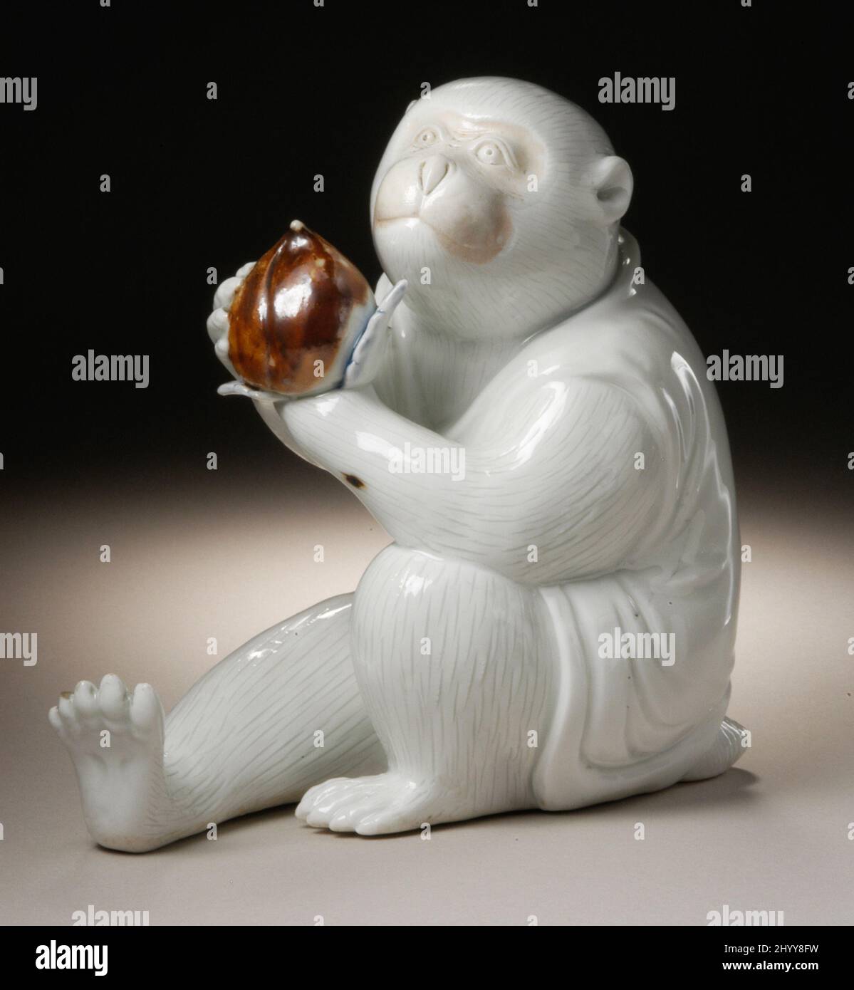 Costumed Monkey Holding a Peach. Japan, 19th century. Ceramics. Hirado ...