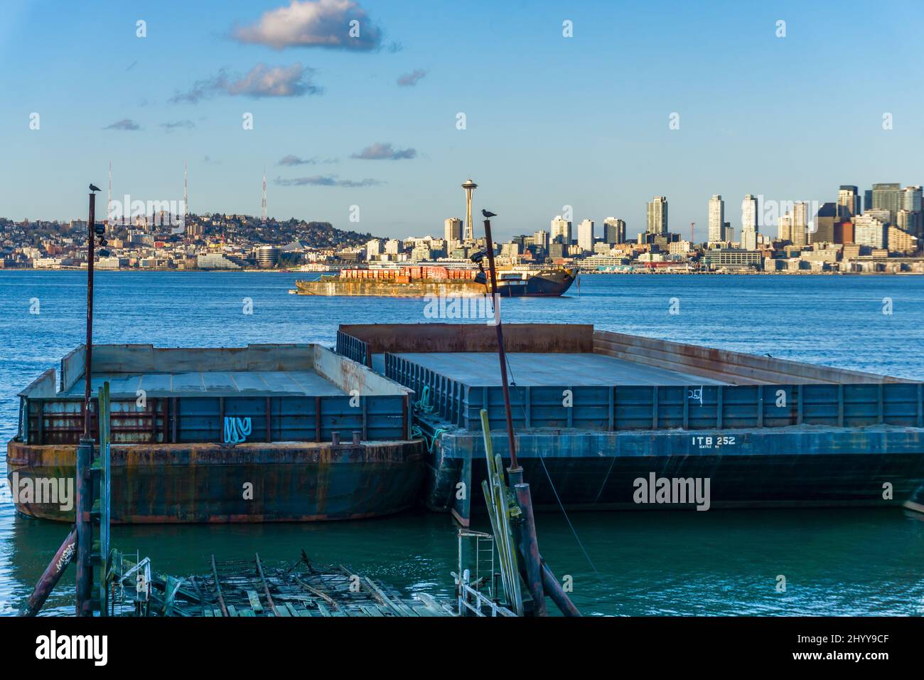 Old pier and barge in West Seattle, Washington Stock Photo - Alamy