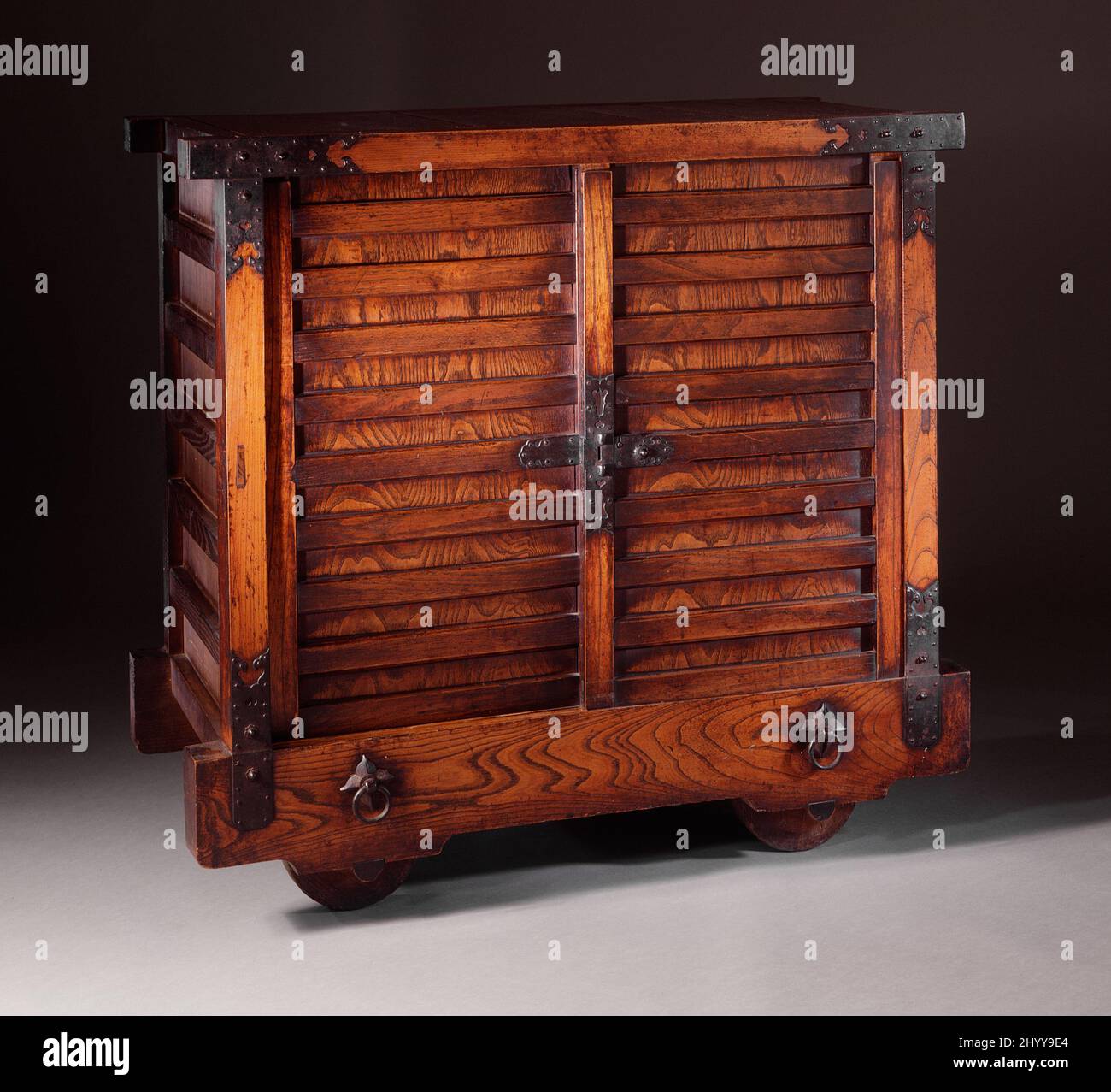 Wheeled Chest with Sliding Door and Two Drawers Stock Photo - Alamy