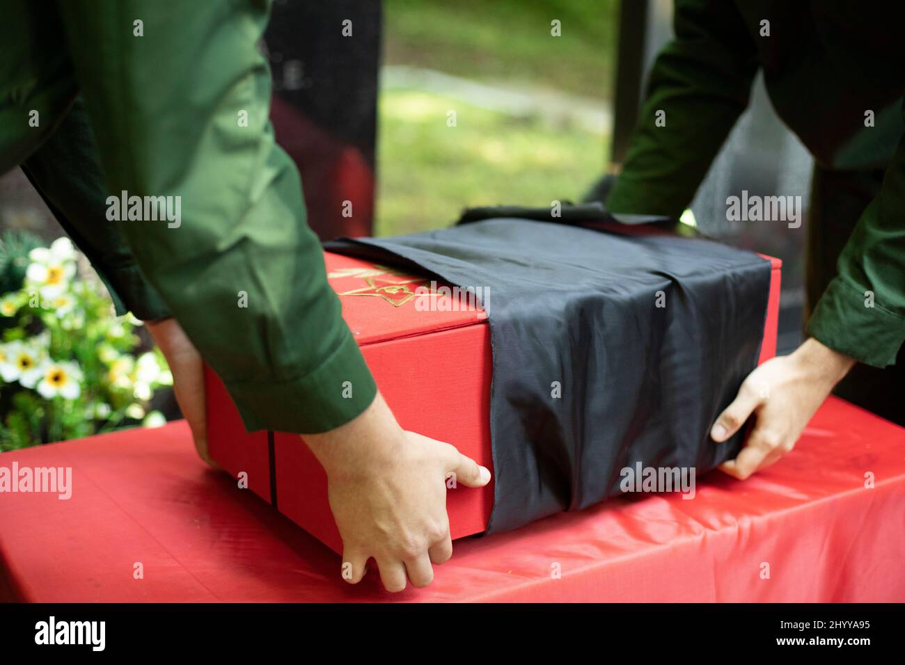 Burial of remains of soldier. Burial ceremony of war hero. Black ...