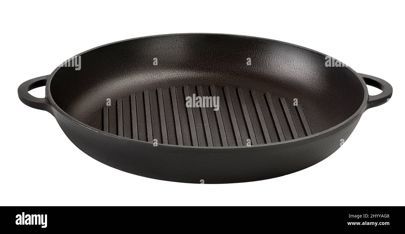 Empty cast iron grill frying pan isolated on white background with ...
