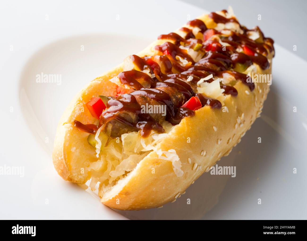 Barbecue Grilled Hot Dog with ketchup on white plate Stock Photo - Alamy