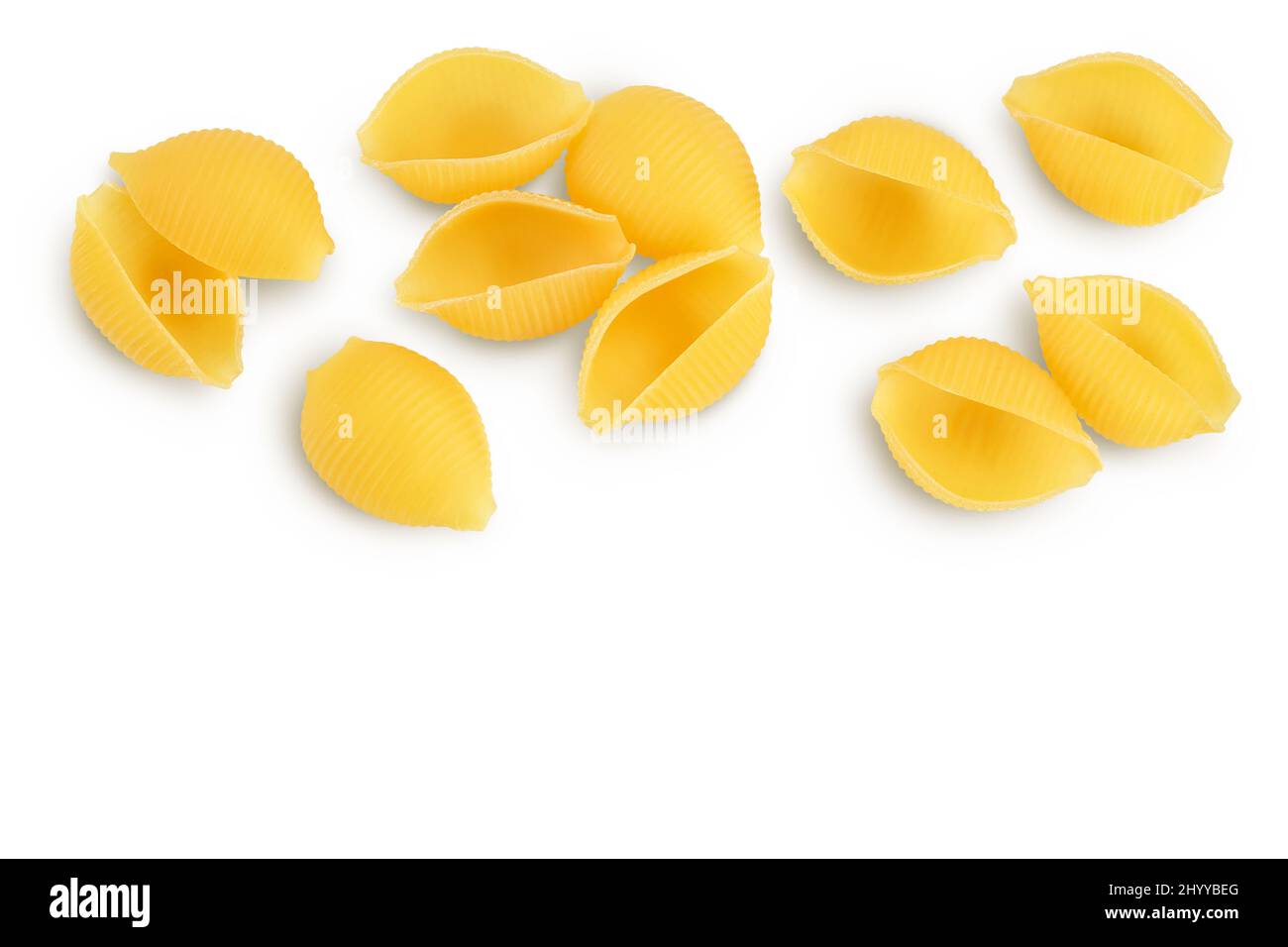 Raw conchiglie shell pasta isolated on white bachground with clipping ...