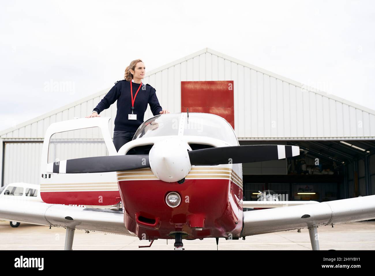 Pilot posing with plane hi-res stock photography and images - Alamy