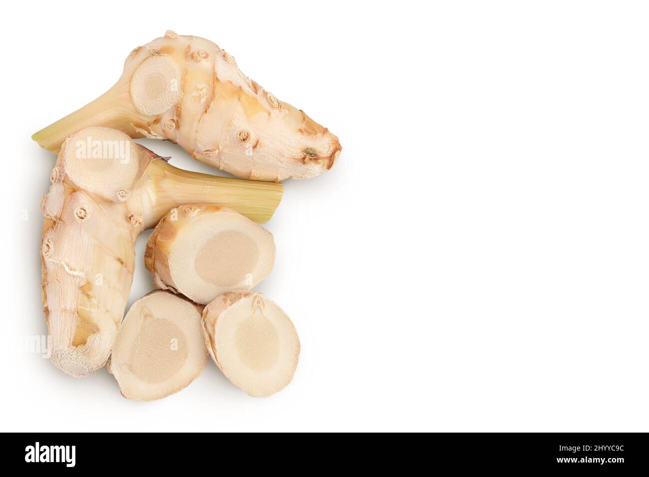 Fresh galangal root with slices isolated on white background with ...