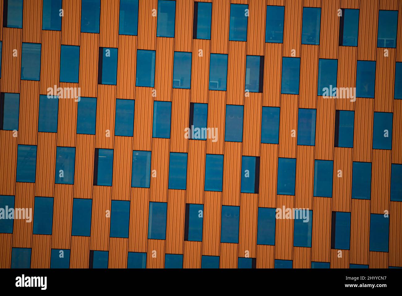 Orange wall with blue rectangles Stock Photo - Alamy
