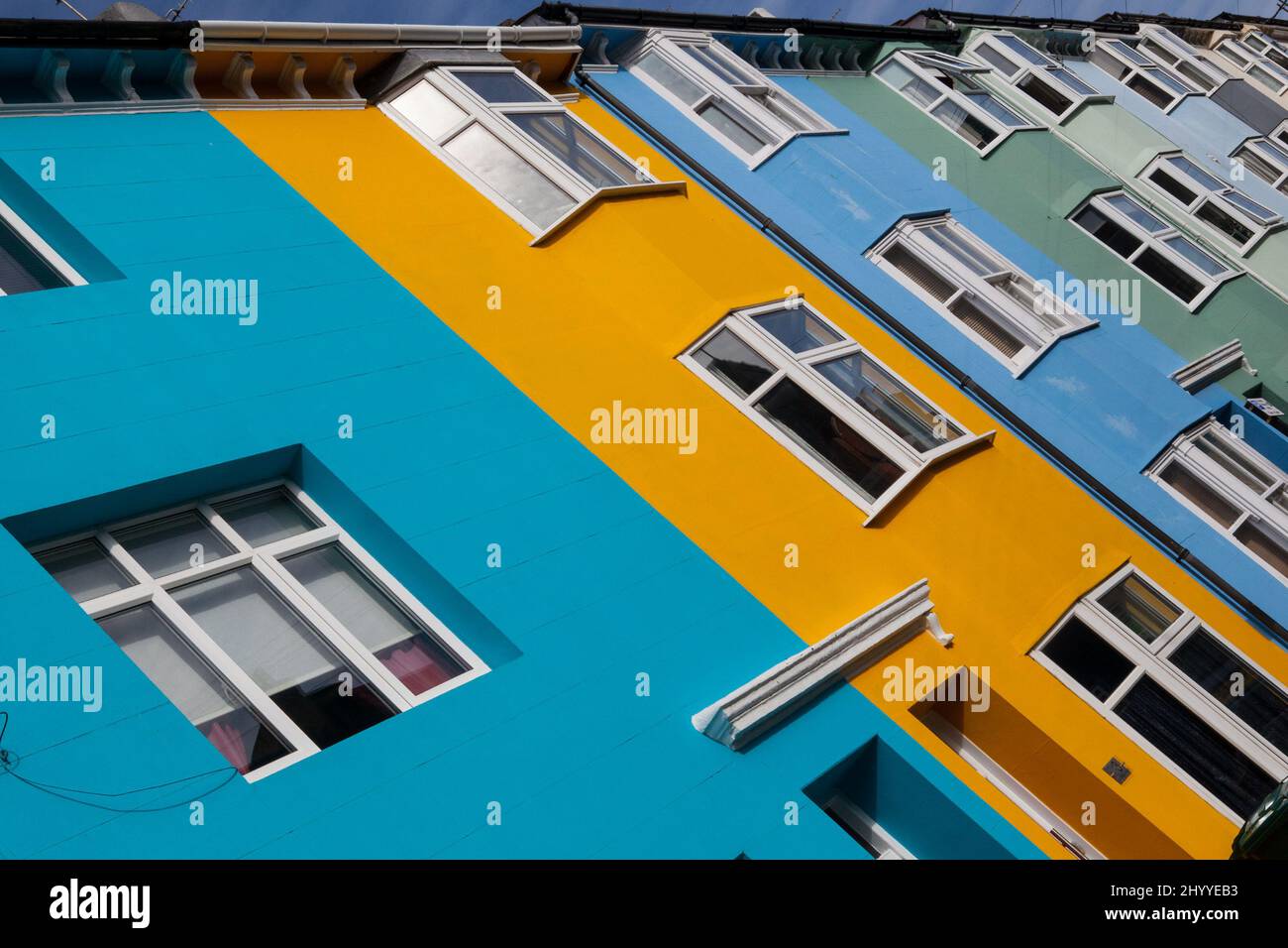 A terrace of brightly painted houses in Brighton, UK Stock Photo - Alamy