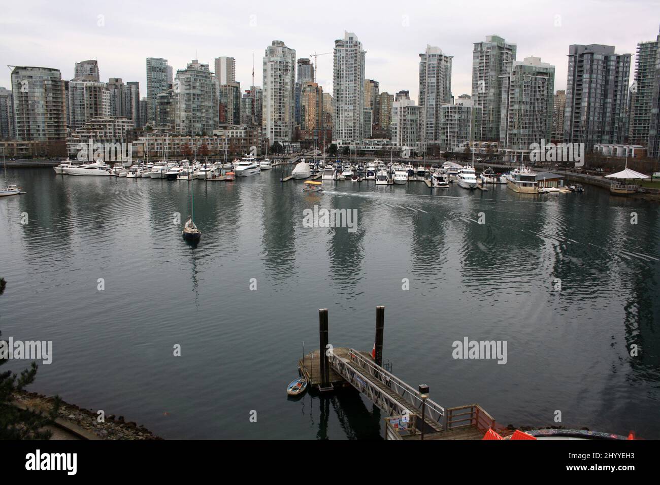 Beautiful view of Yachts, boats, and tall buildings in Vancouver ...