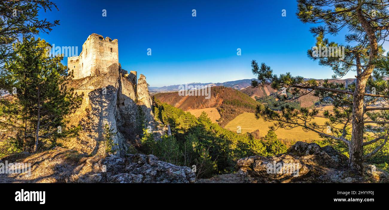 The medieval castle Lietava on a rocky reef with panoramic view of the ...