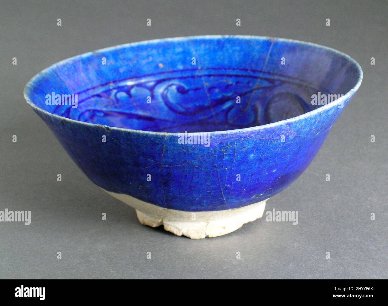 Vessel. Syria, 11th-12th century. Ceramics. Fritware, carved and glazed ...