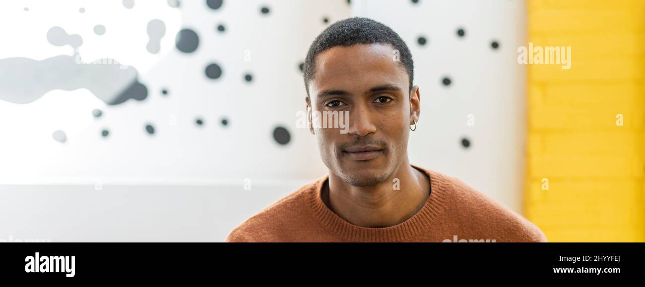 Horizontal banner or header with young Moroccan man with magnetic gaze ...