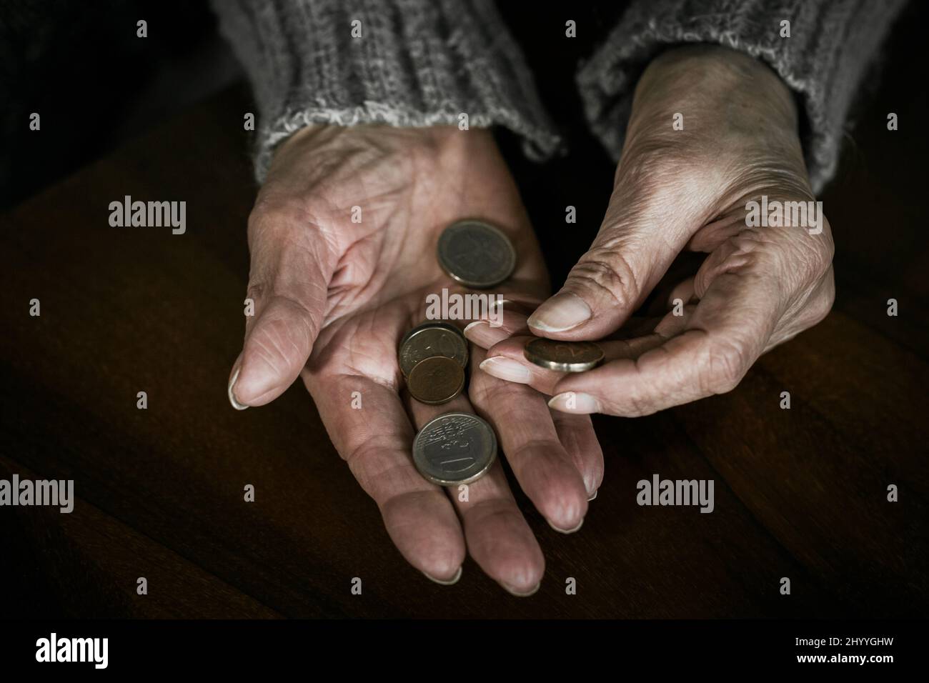 Poor woman counting money hi-res stock photography and images - Alamy