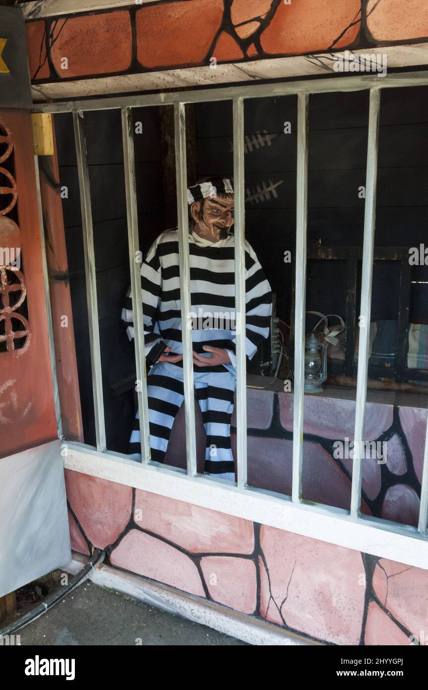 Statue of a criminal at the park Stock Photo - Alamy