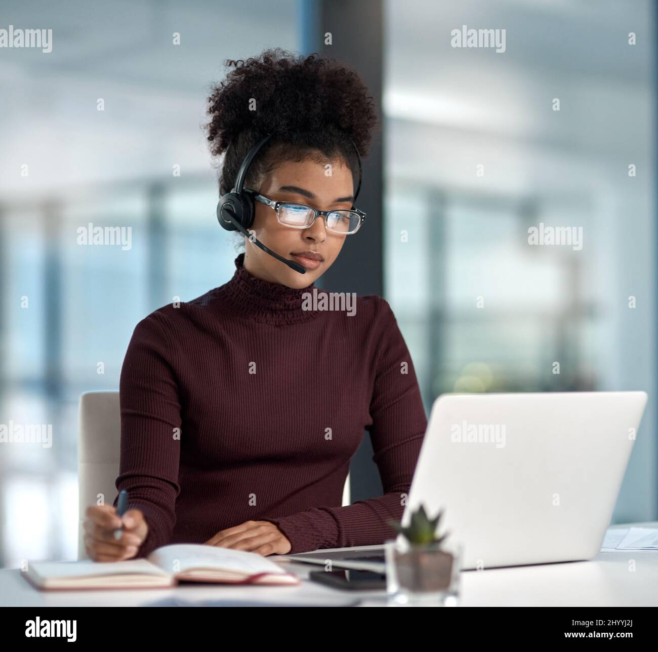 Professional young woman looking intently hi-res stock photography and ...