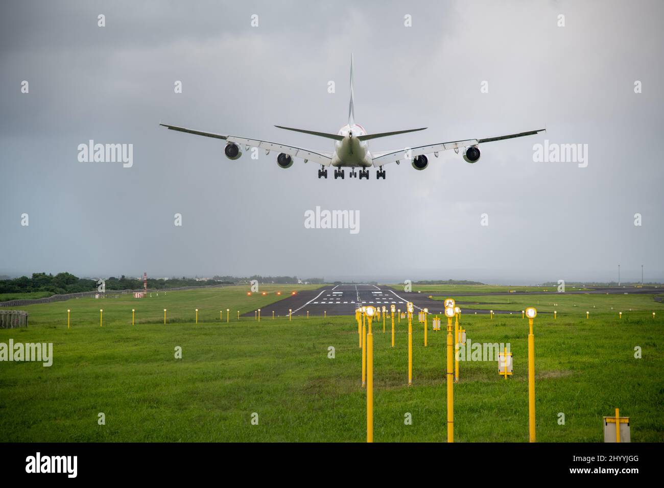 Giant aircraft landing at the airport with runway in the background ...