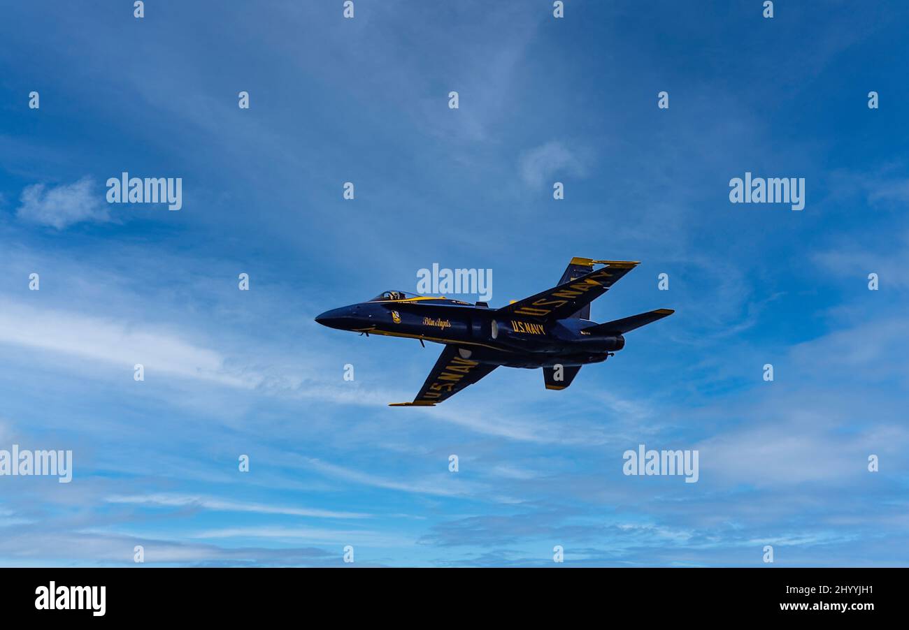 U.S. Navy Blue Angels' plane performing with slow-speed fly-bye in a ...