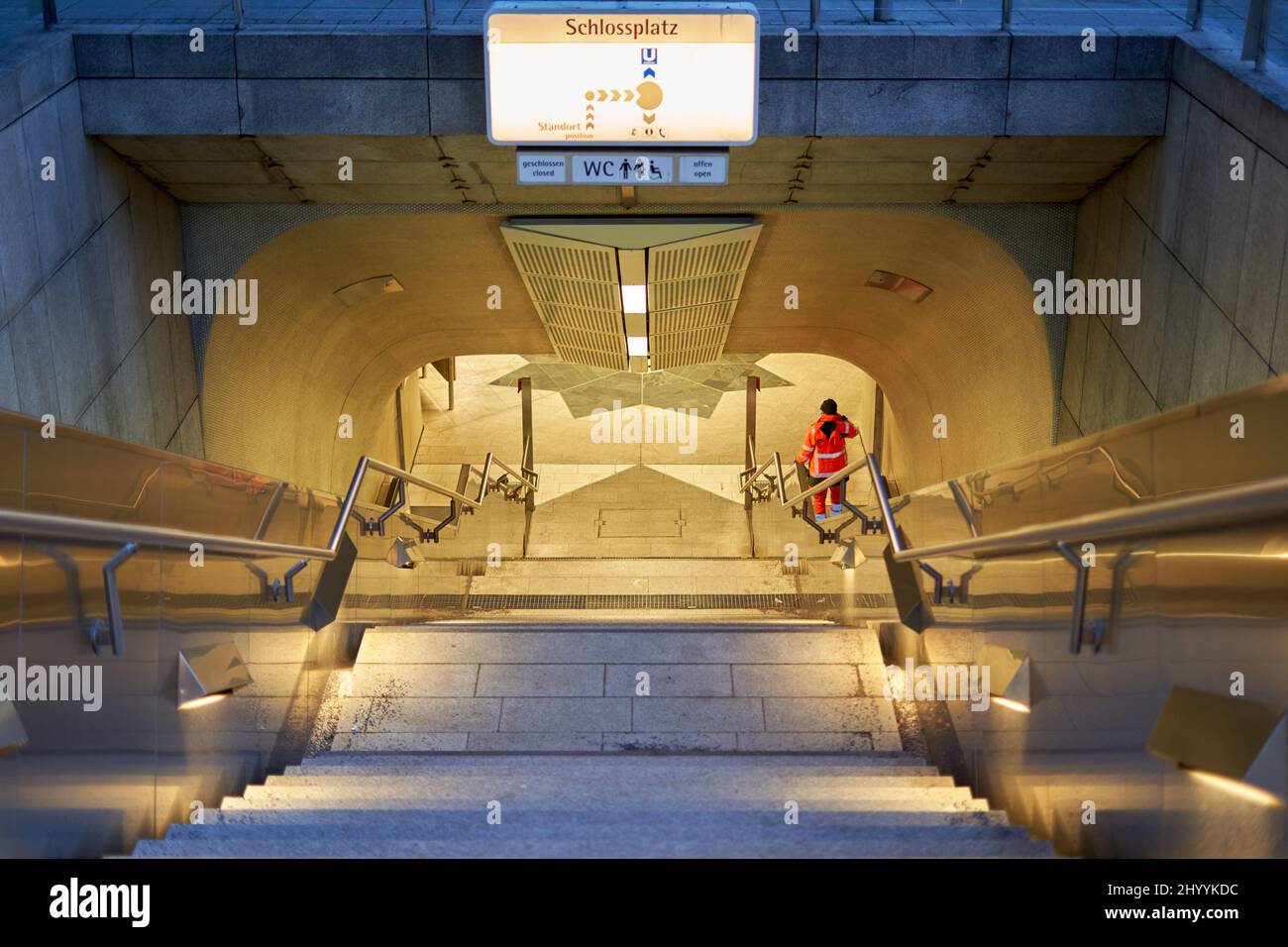 Steps down to the subway station. Illuminated exit to public transport ...