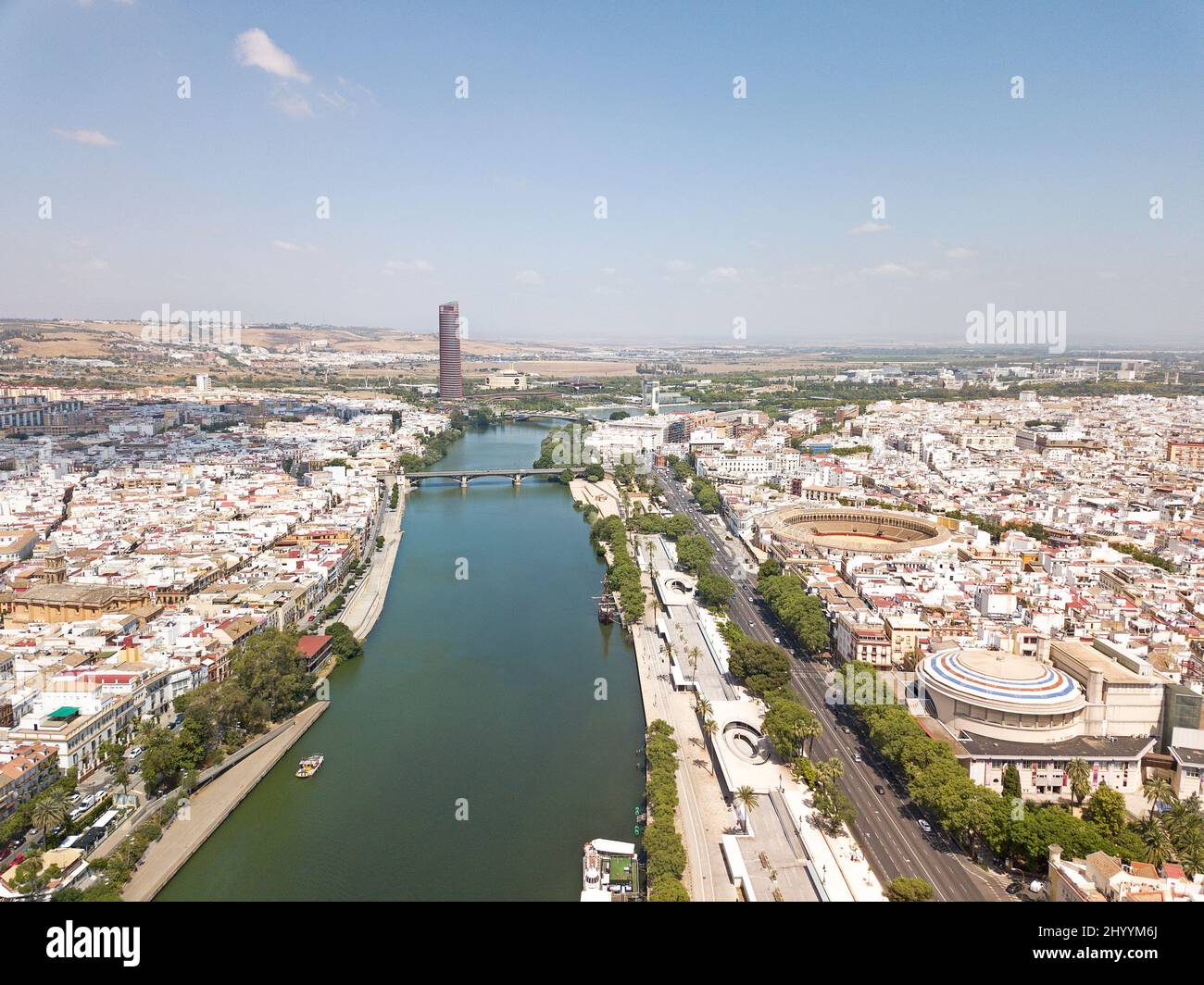 Aerial perspective of Seville city. View of the Guadalquivir River, the ...