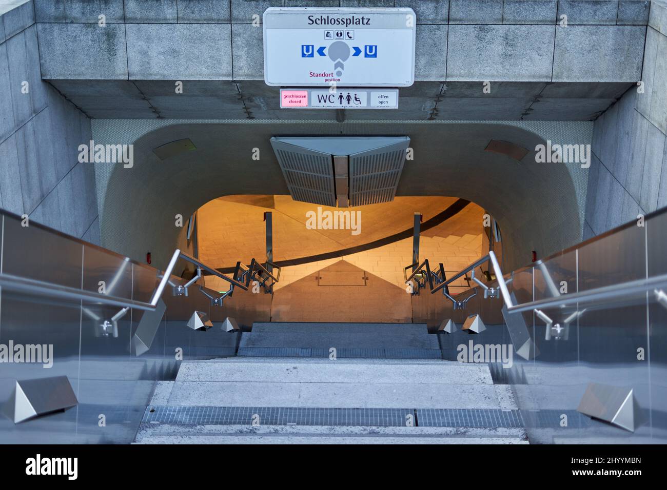Steps down to the subway station. Illuminated exit to public transport ...