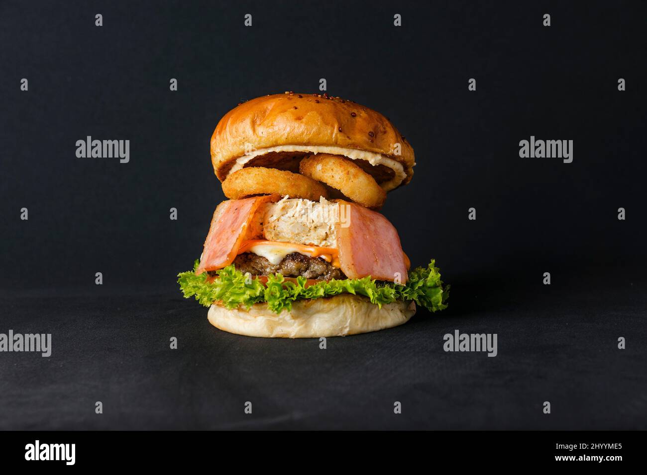 delicious burger ready to enjoy with family or friends Stock Photo - Alamy
