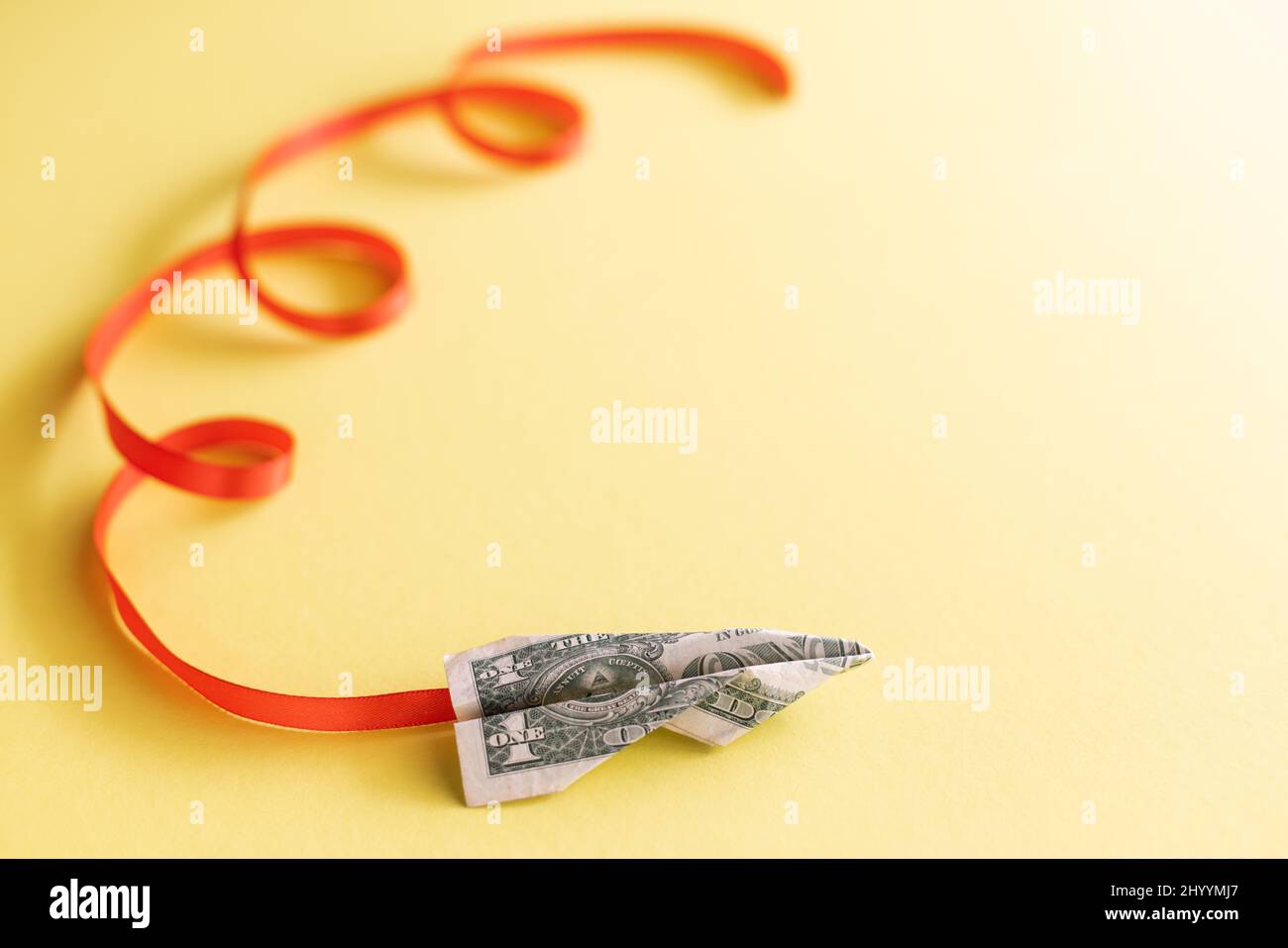Paper plane made of one dollar bill Stock Photo - Alamy