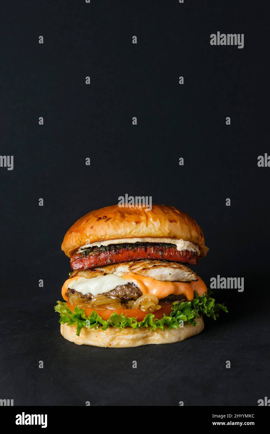 delicious burger ready to enjoy with family or friends Stock Photo - Alamy