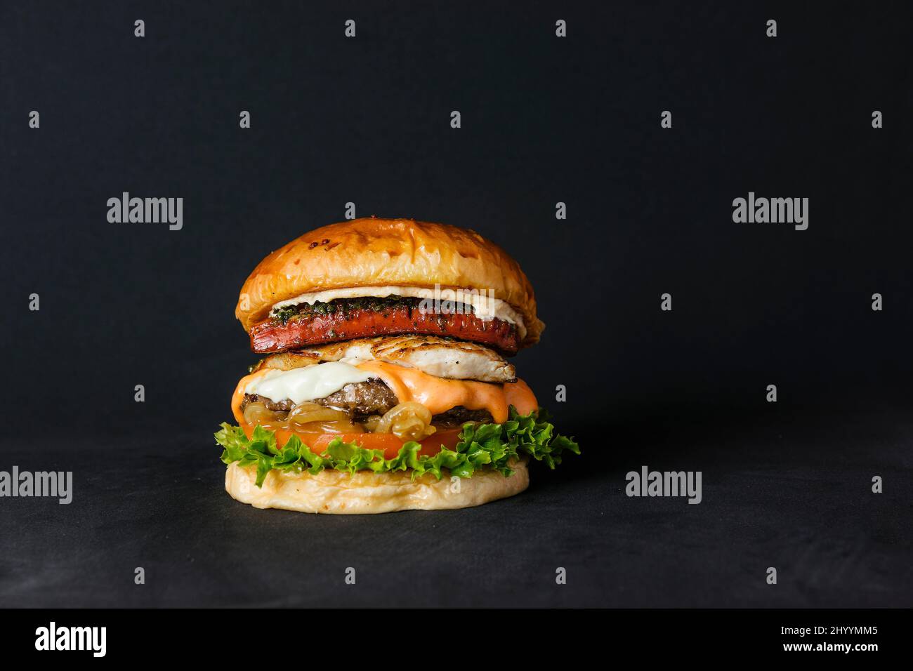 delicious burger ready to enjoy with family or friends Stock Photo - Alamy