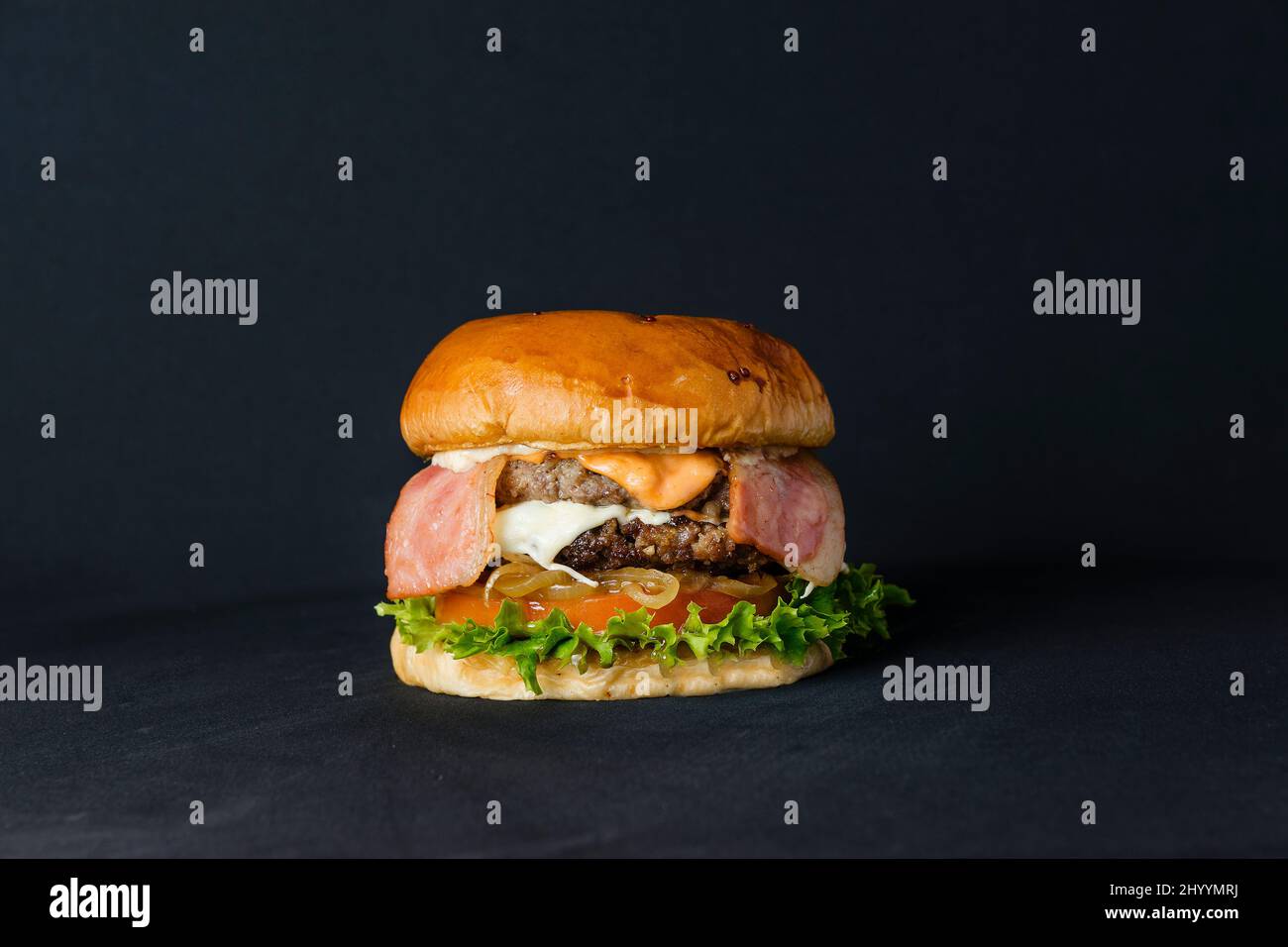delicious burger ready to enjoy with family or friends Stock Photo - Alamy