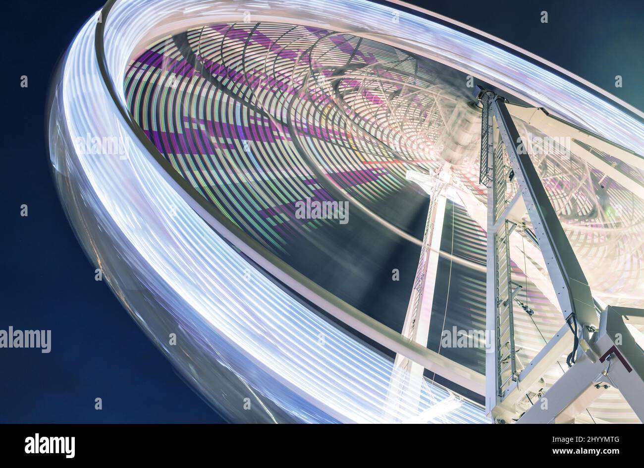 Spinning panoramic wheel. View at night Stock Photo - Alamy
