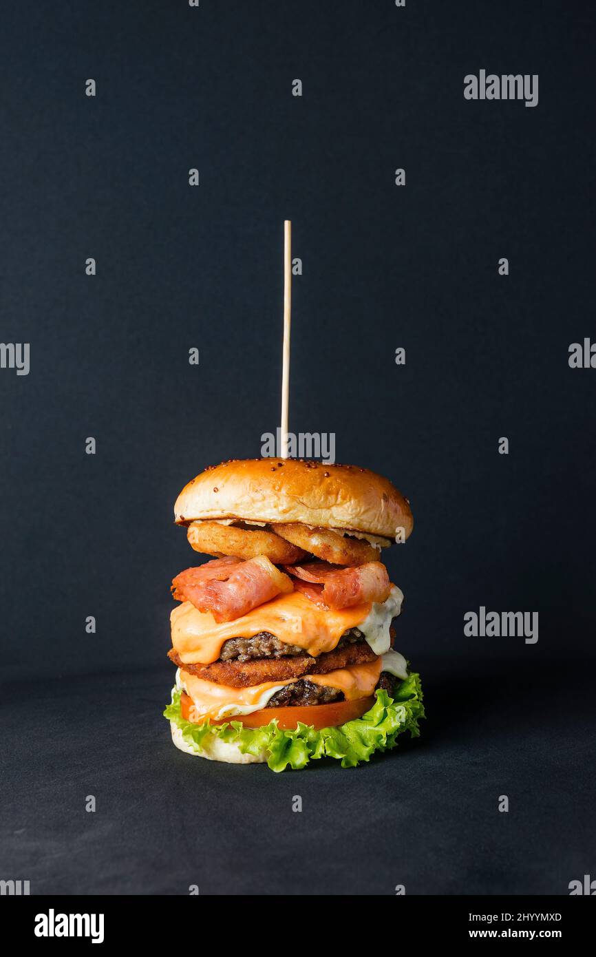 delicious burger ready to enjoy with family or friends Stock Photo - Alamy
