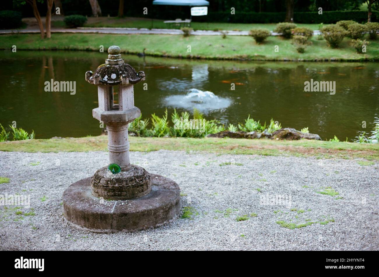 Asian lantern statue in the garden of the Bydo-in temple. Oahu, Hawaii ...