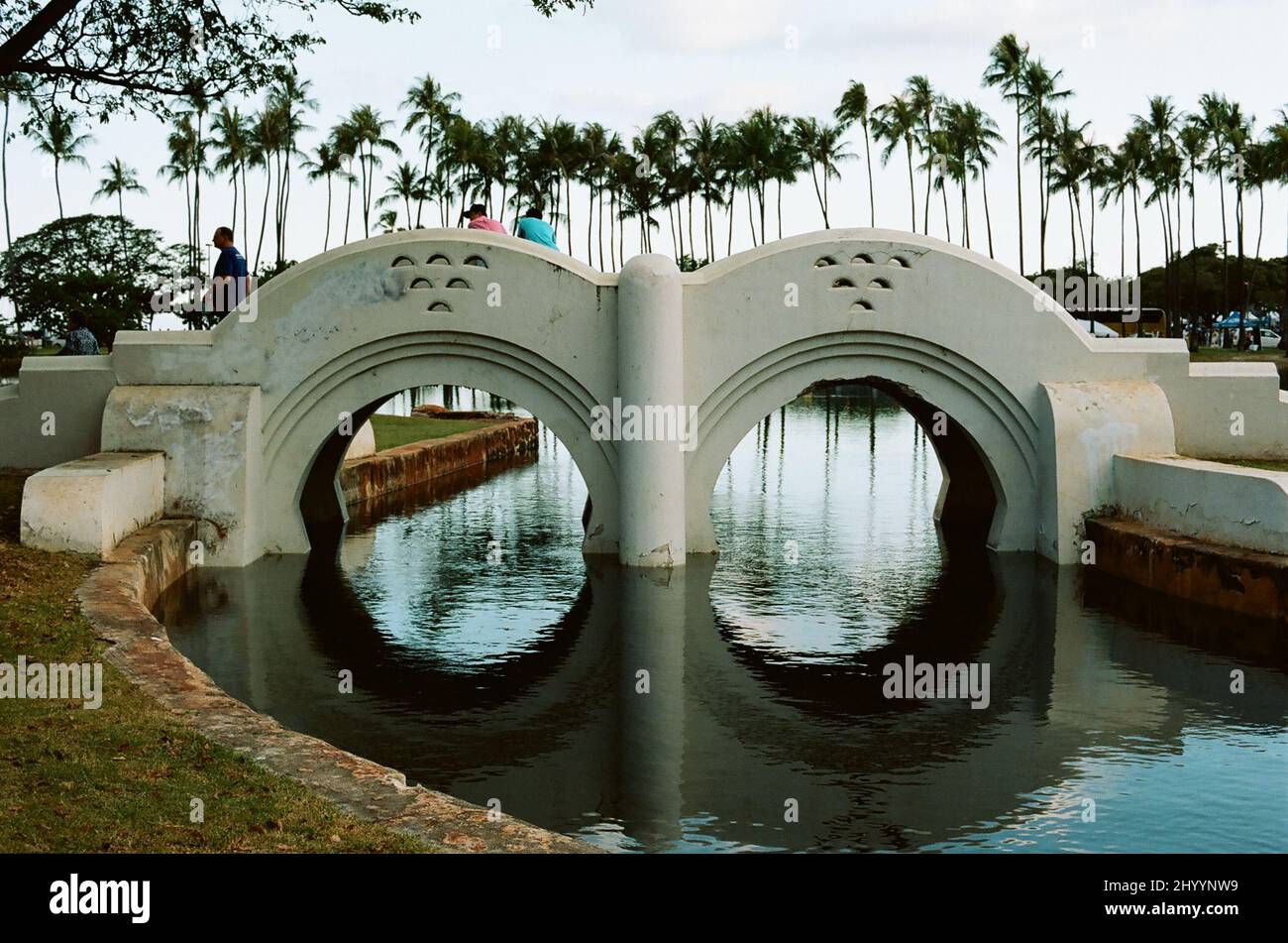 Bridge with a rainbow shape over a small stream in Oahu Honolulu Ala ...