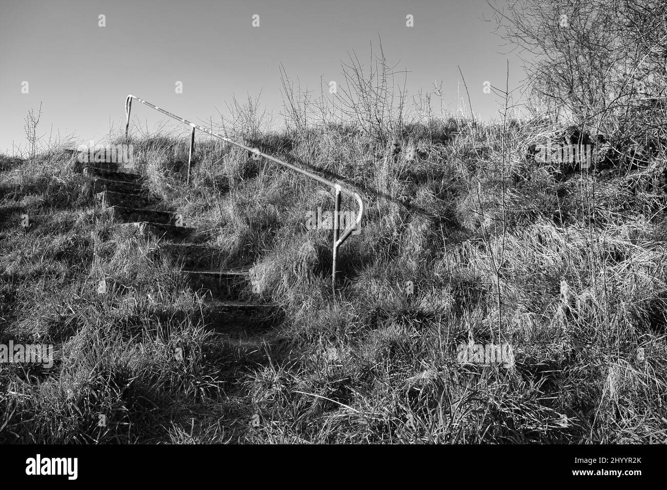 Grayscale shot of stairs leading up a hill in Maransart, Belgium Stock ...