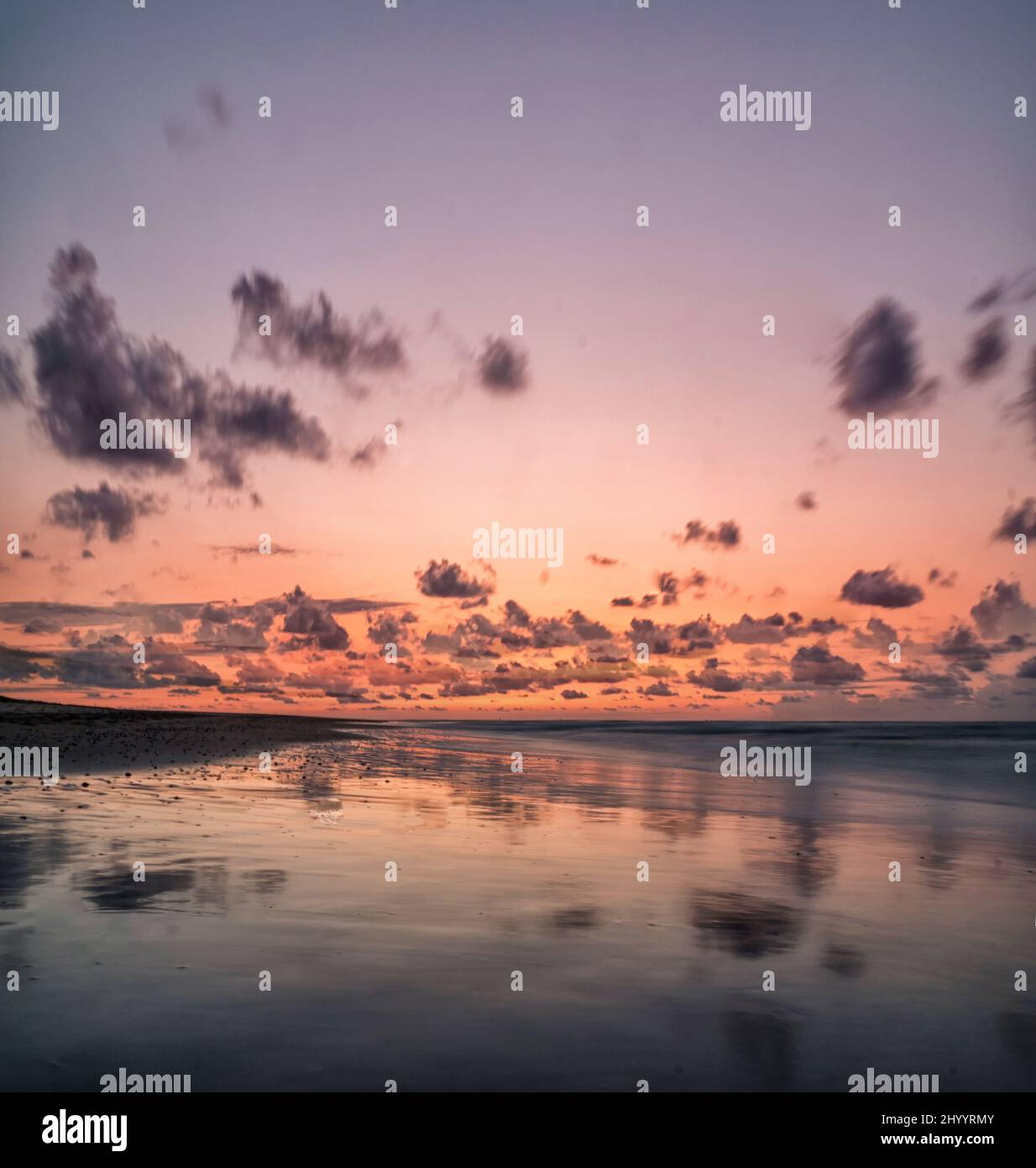 Beautiful sunset at Atlantic ocean coast with the orange sky in the ...
