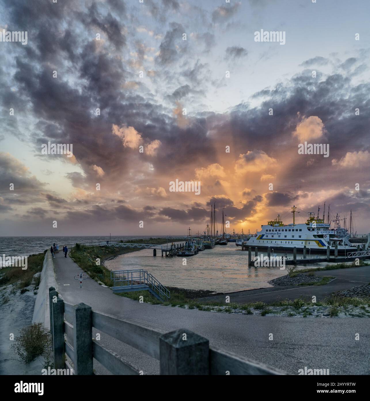 Beautiful sunset at Atlantic ocean coast with the orange sky in the ...