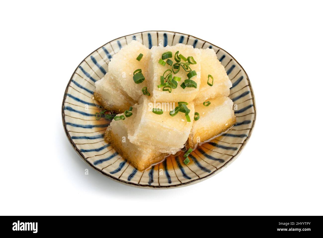 Agedashi tofu, a Japanese traditional dish, isolated on white Stock ...