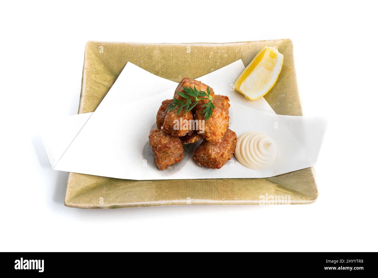 Deep fried tuna chunks, a Japanese dish. Isolated on white Stock Photo ...